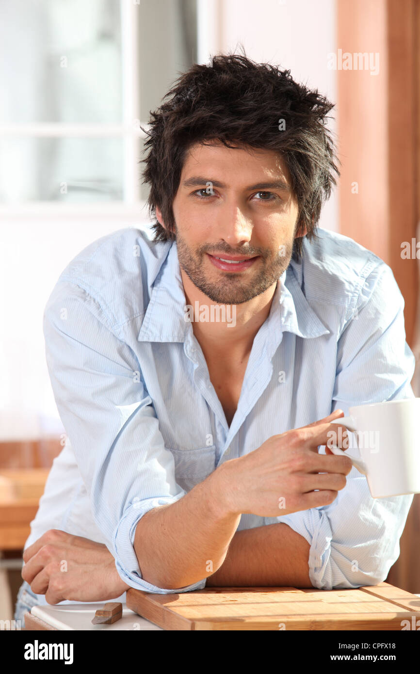 Man with cup of coffee Stock Photo - Alamy