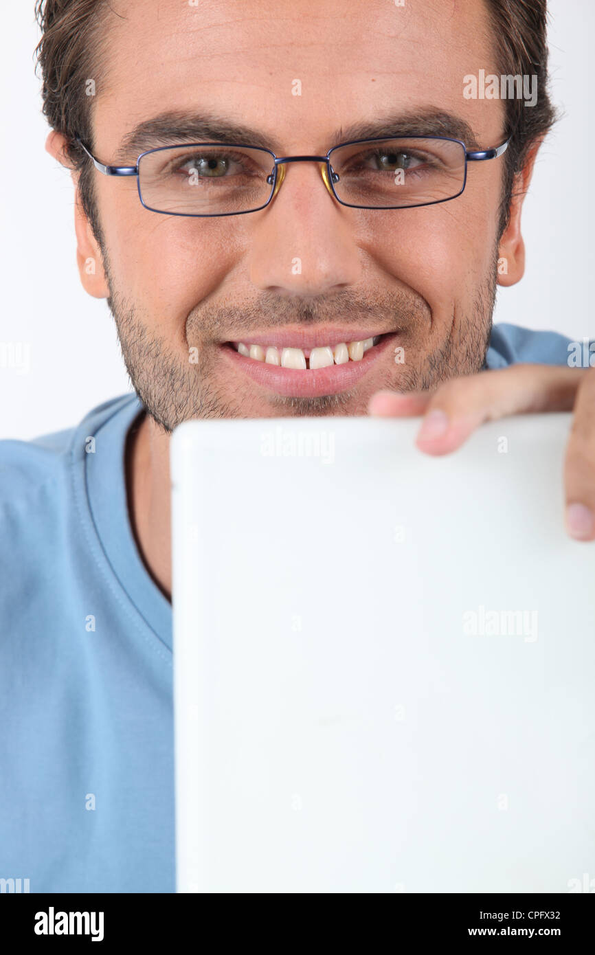 Man with glasses in front of computer Stock Photo - Alamy
