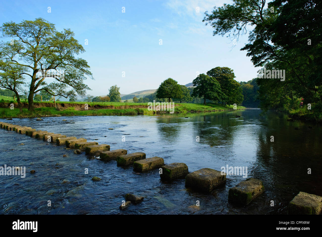 Stepping stones on the River Hodder near Whitewell in the Forest of ...