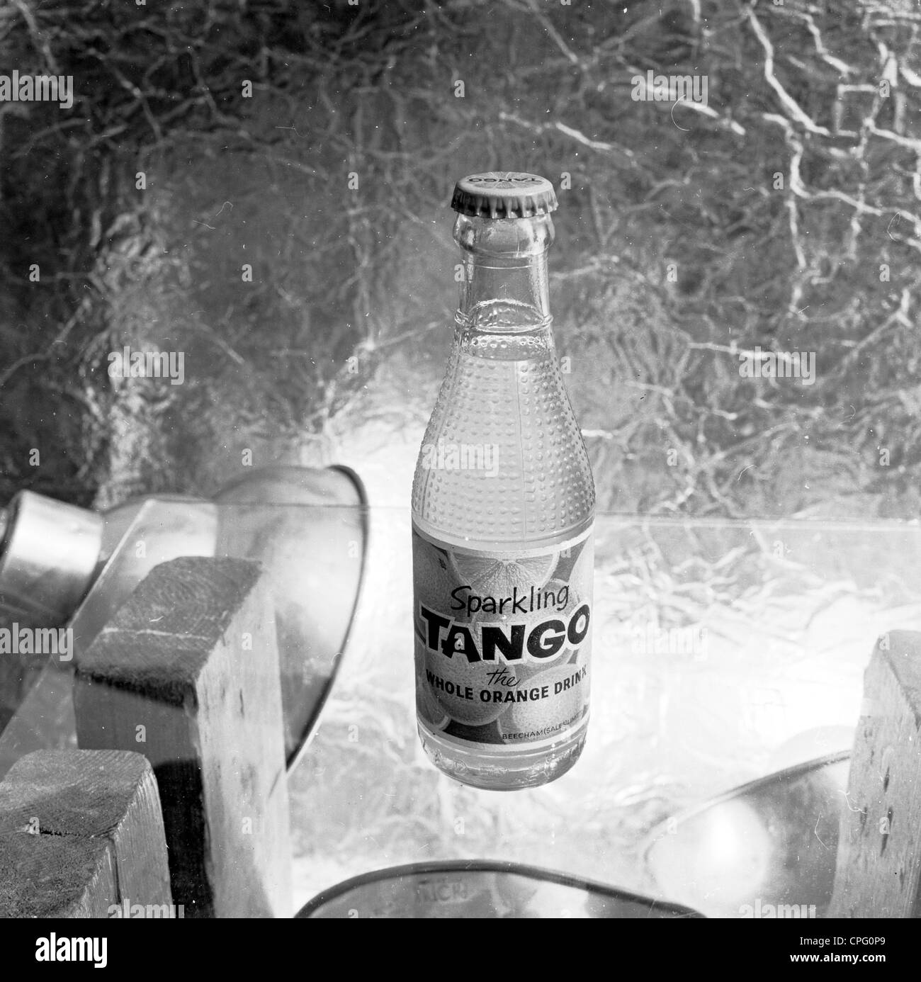 Advertising1960s style. Out take which shows a bottle of Tango soft ...
