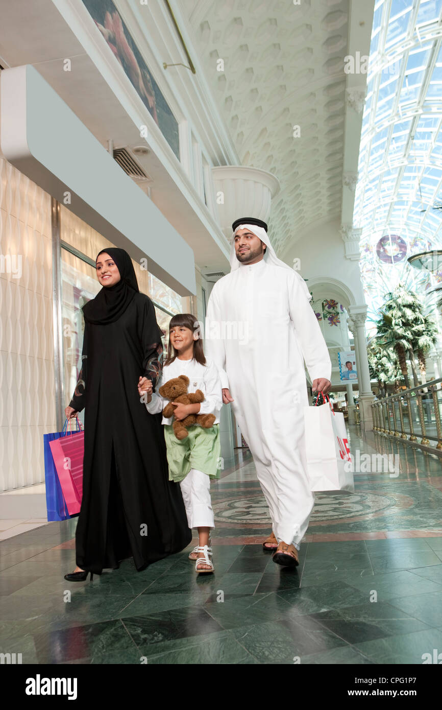 Arab Family with shopping bags at the mall Stock Photo - Alamy