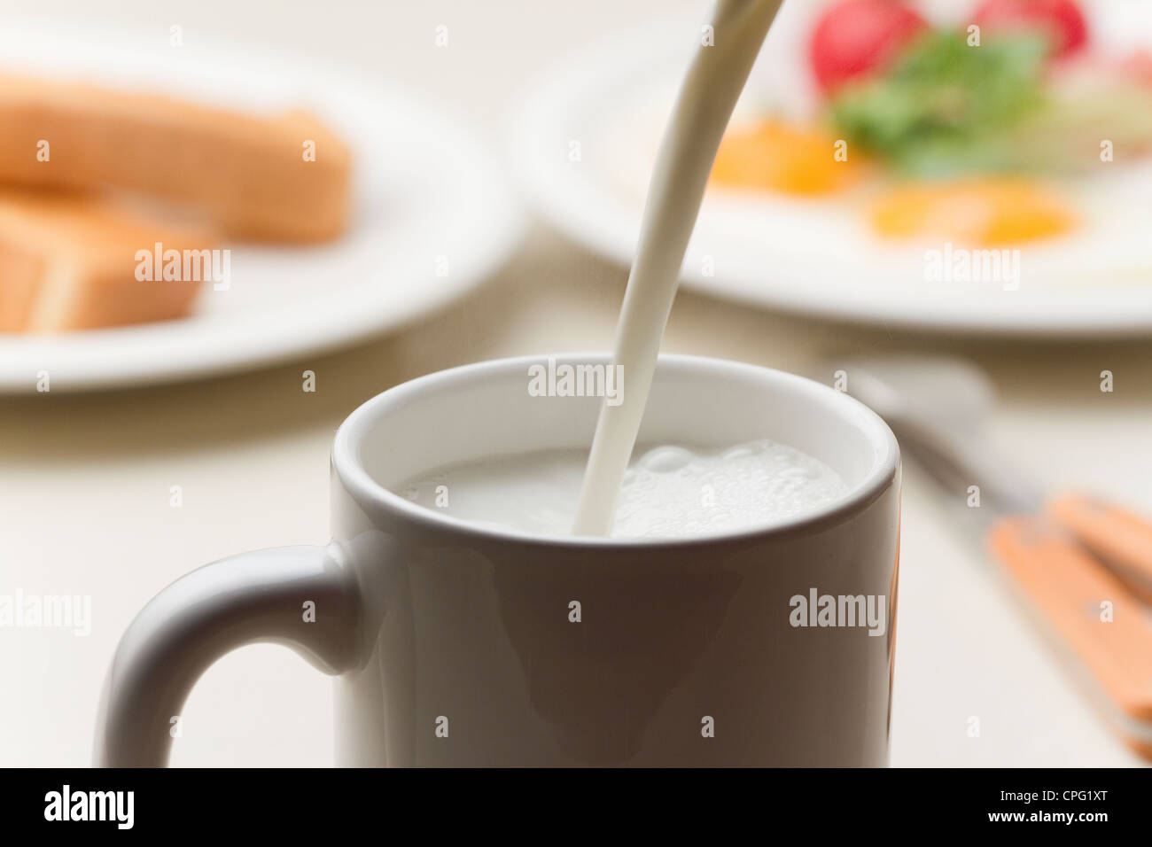 Cup Of Milk Stock Photo - Alamy