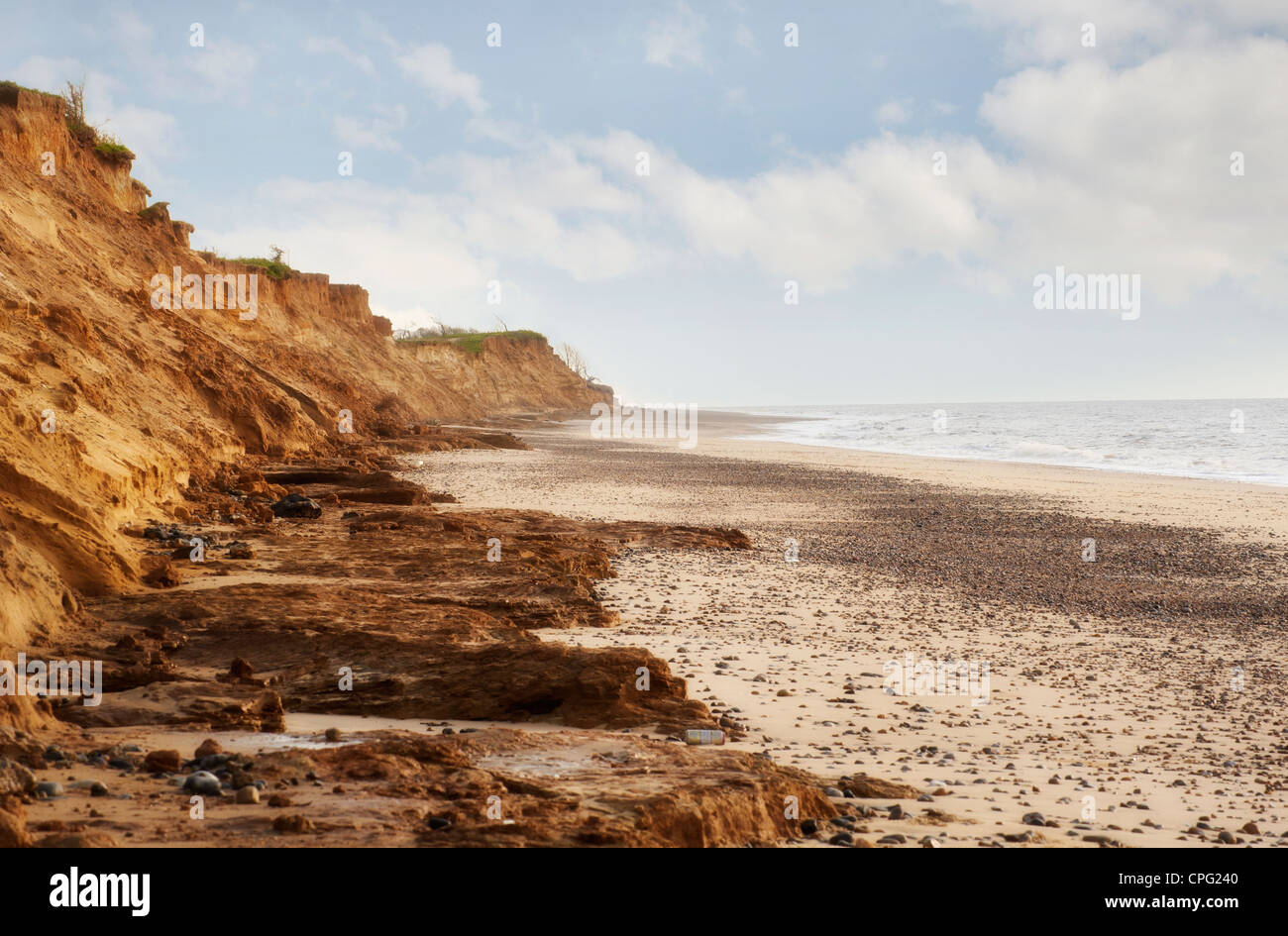Beach view with sand, sea and sandy cliffs Stock Photo - Alamy