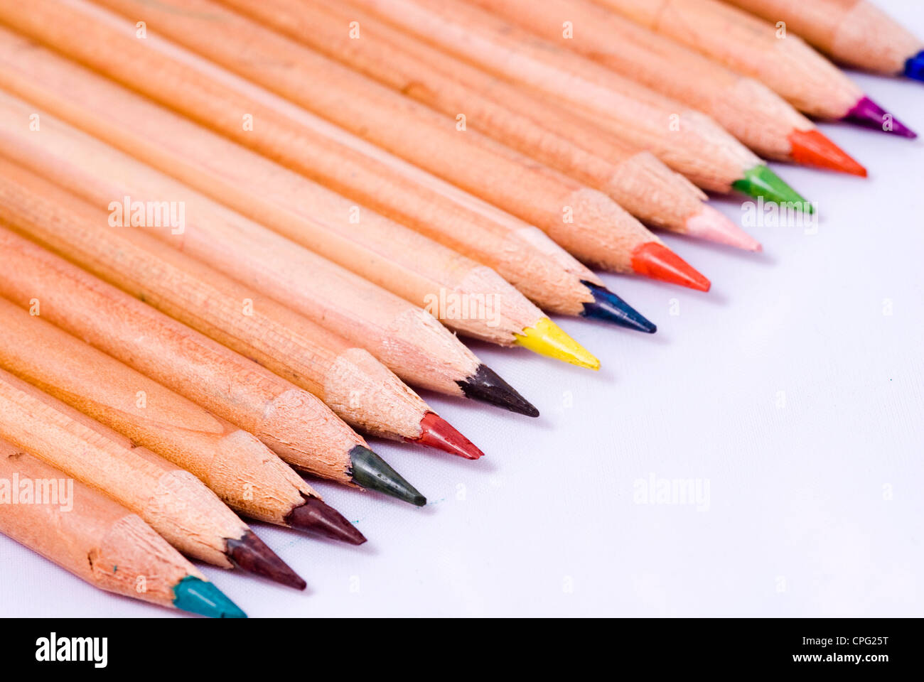 Sharp coloring pencils on a white background Stock Photo - Alamy