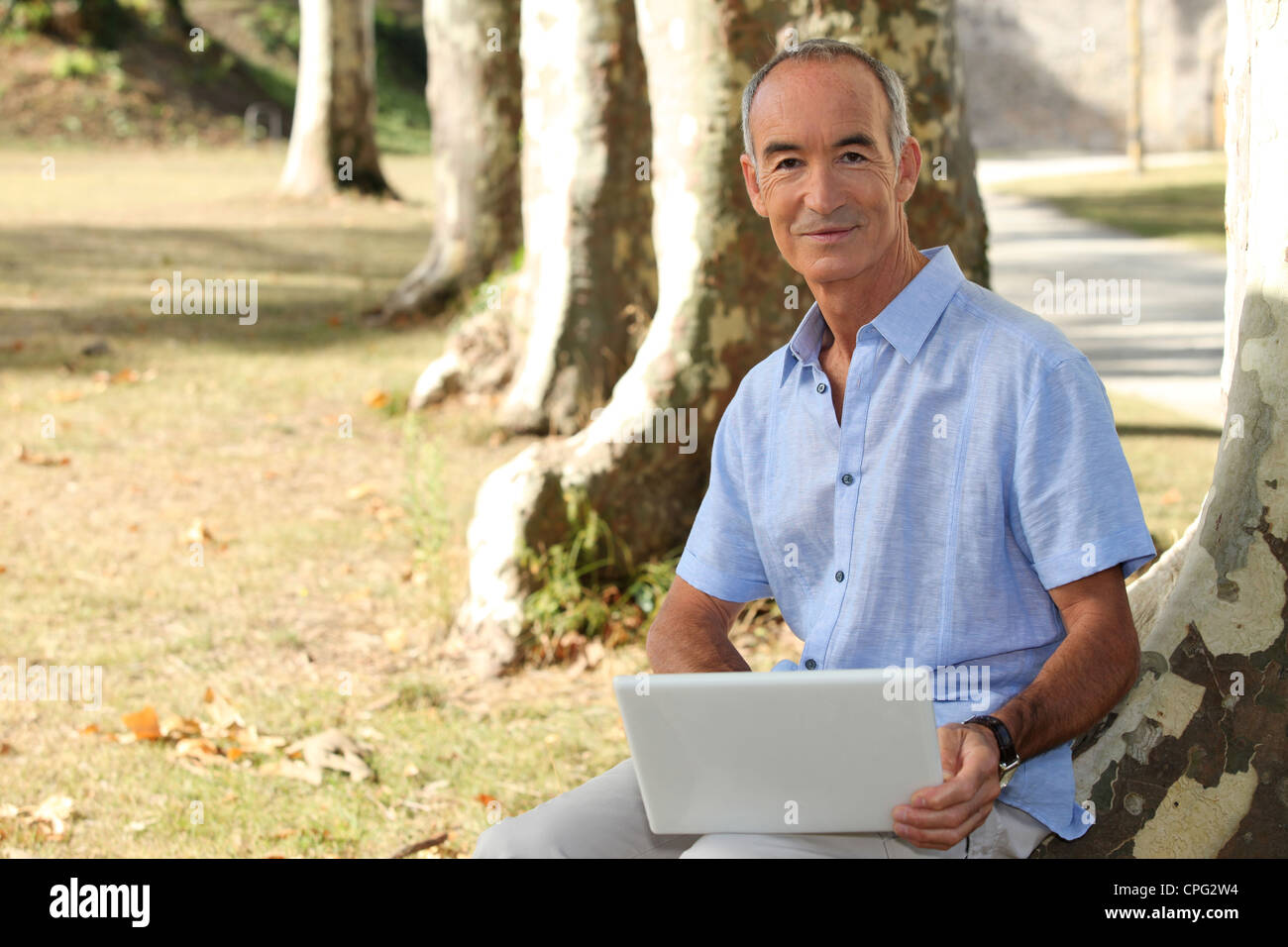 Man with computer Stock Photo - Alamy