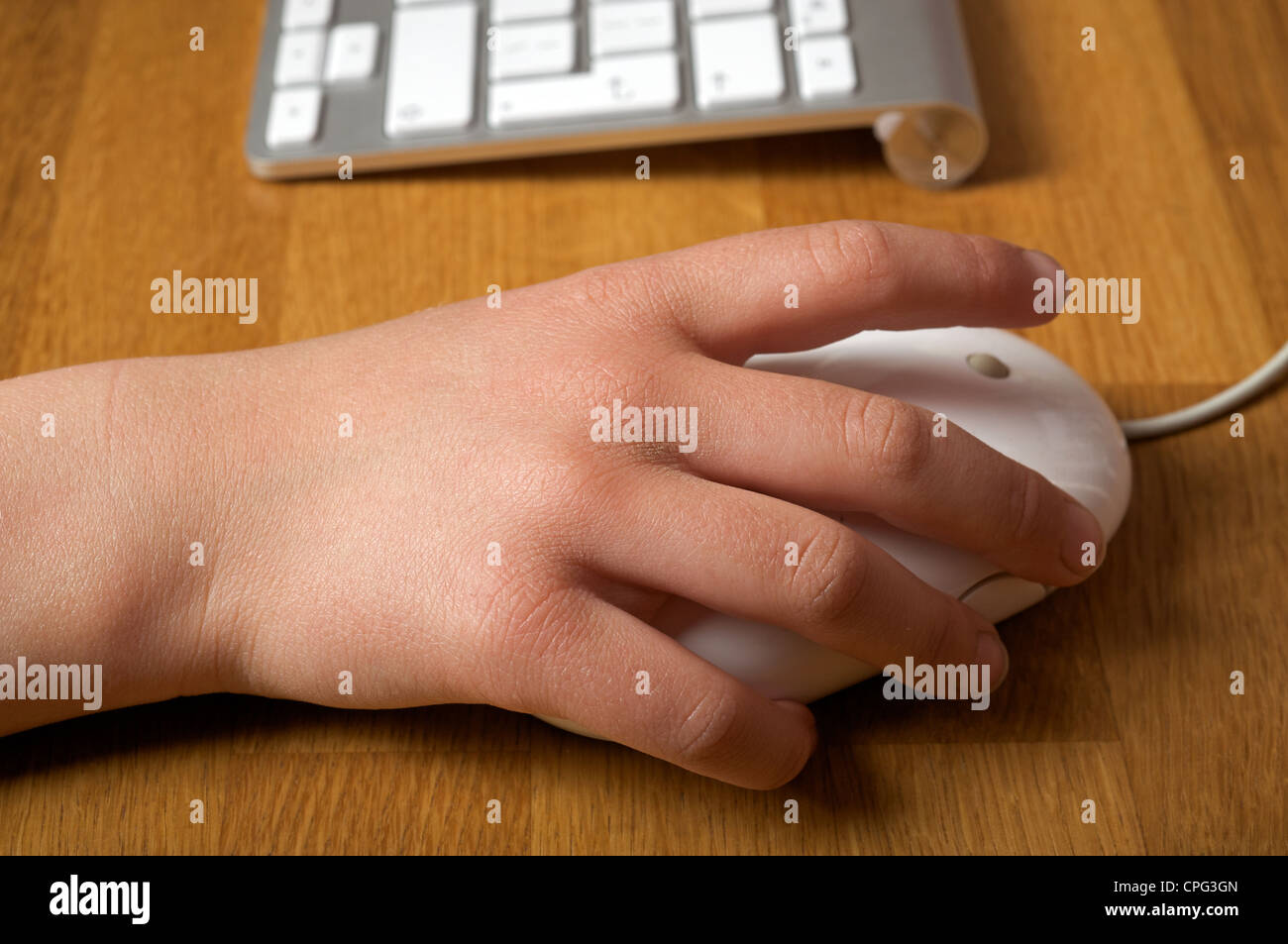 Child using computer Stock Photo - Alamy