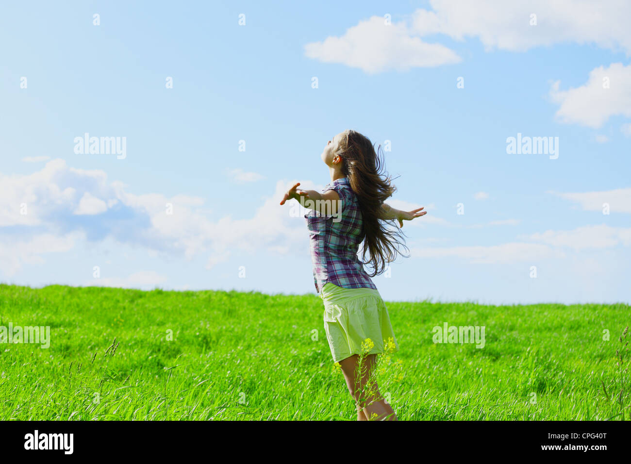 woman on summer green field feel freedom Stock Photo - Alamy