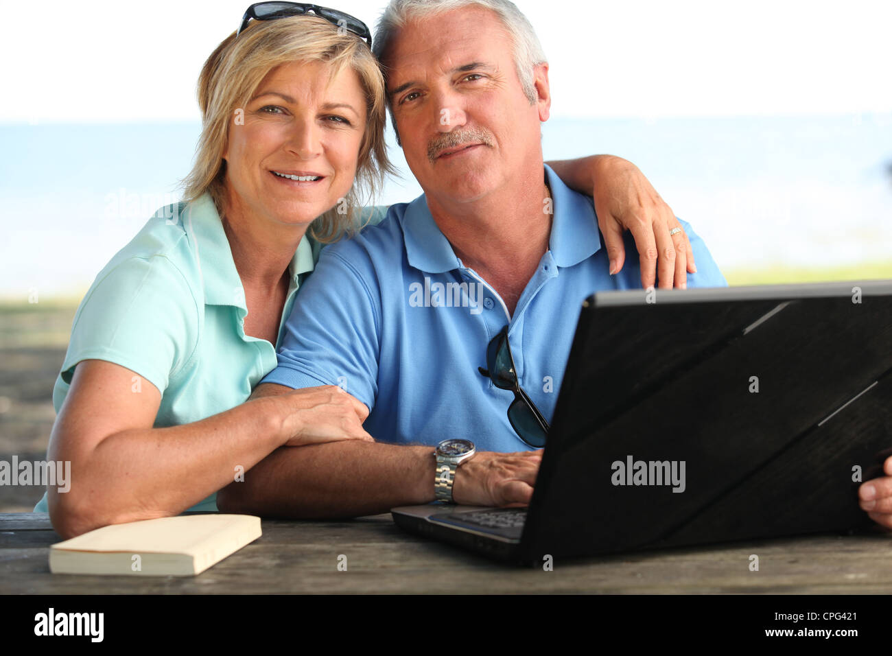 Couple of older computer and book Stock Photo - Alamy