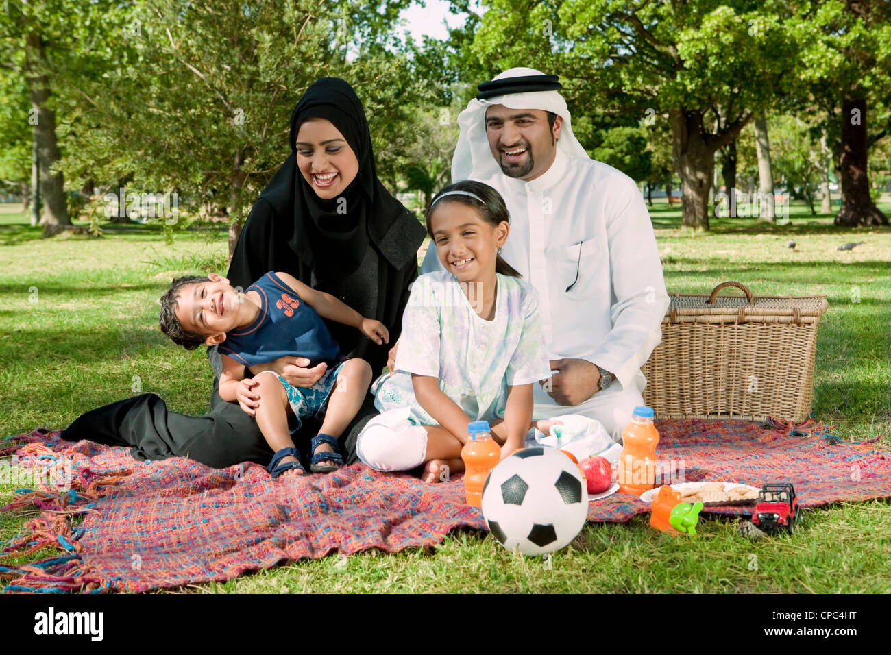 Arab family picnic in park hi-res stock photography and images - Alamy