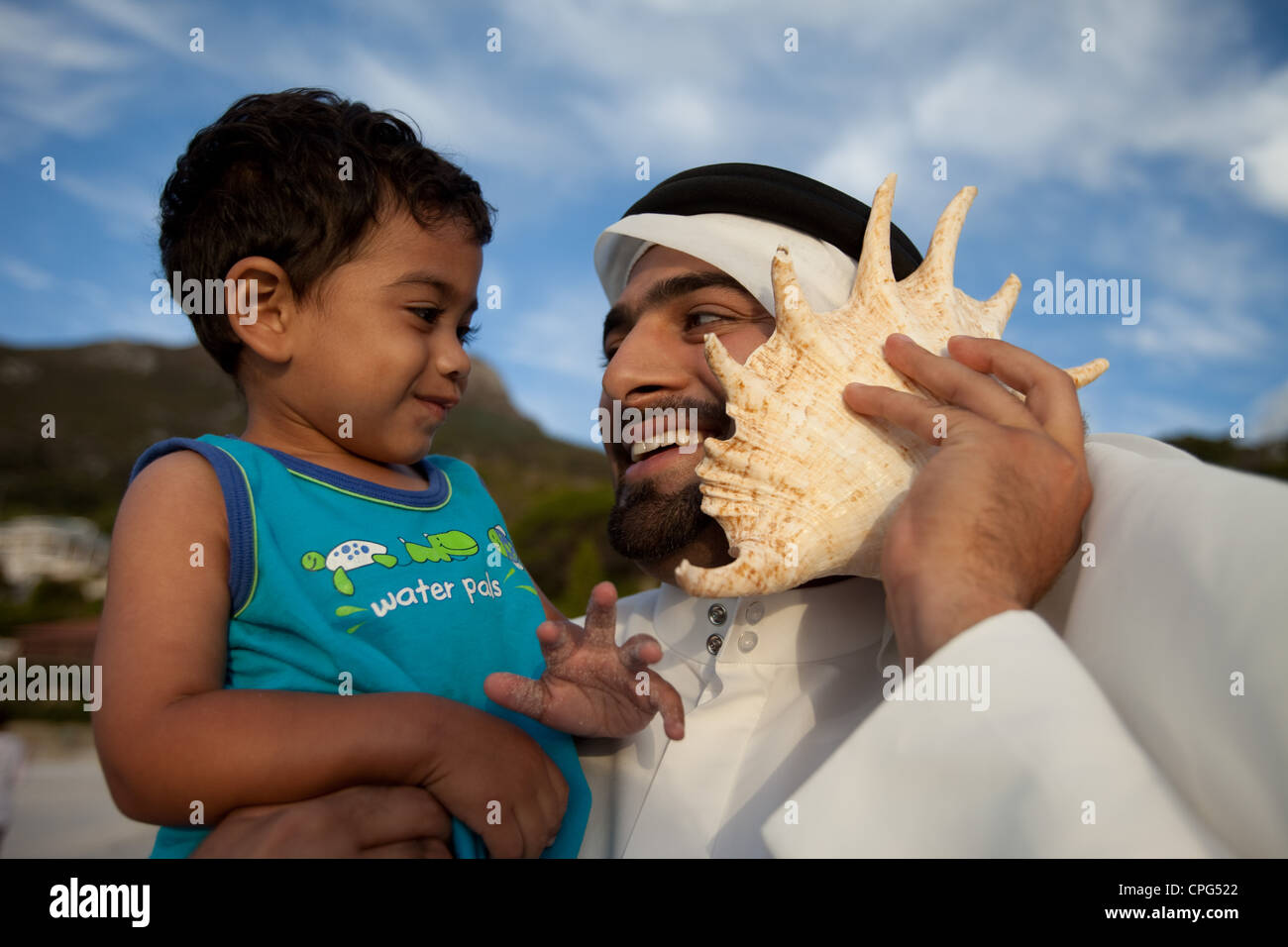 Father carrying son arab hi-res stock photography and images - Alamy