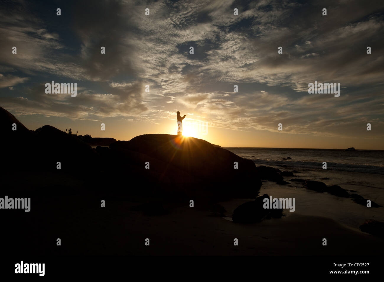 Praying on the beach hi-res stock photography and images - Alamy