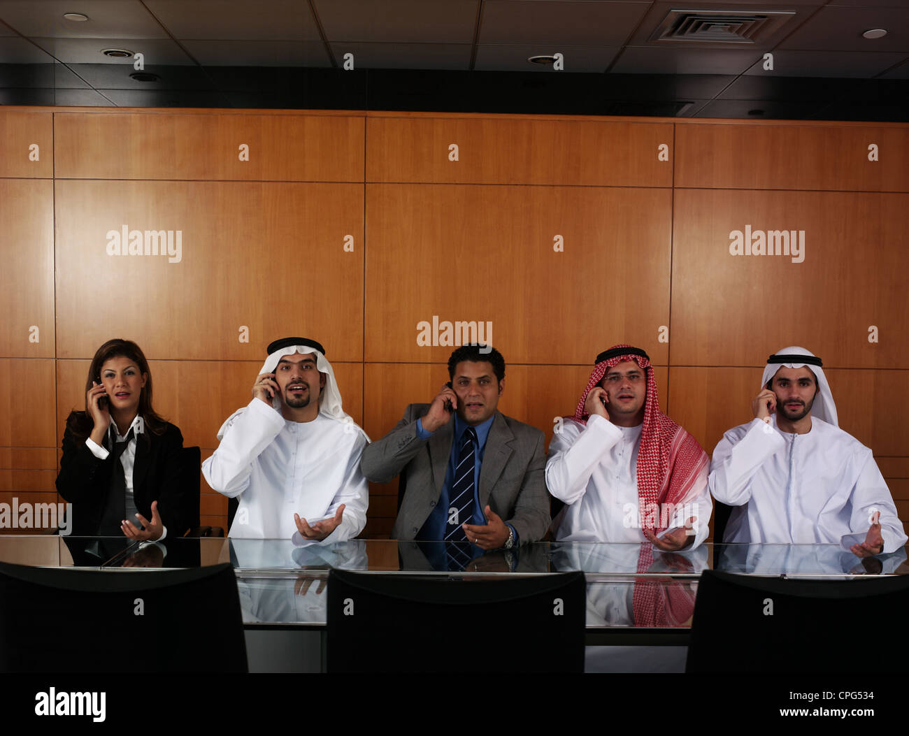 Emirati businessman boardroom hi-res stock photography and images - Alamy