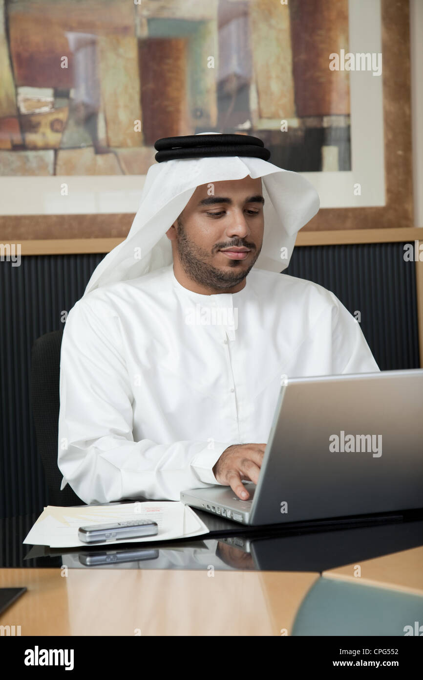 Middle east man using laptop hi-res stock photography and images - Alamy