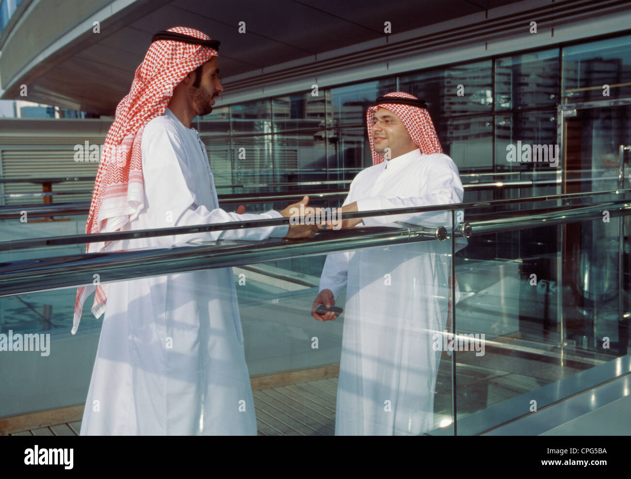 Arab men talking Stock Photo - Alamy
