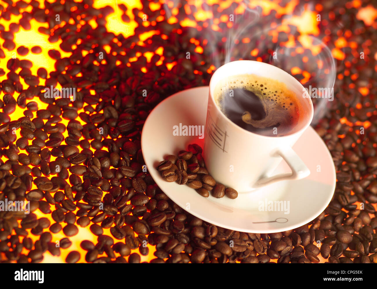 Cup of coffee over toasted coffee beans Stock Photo - Alamy