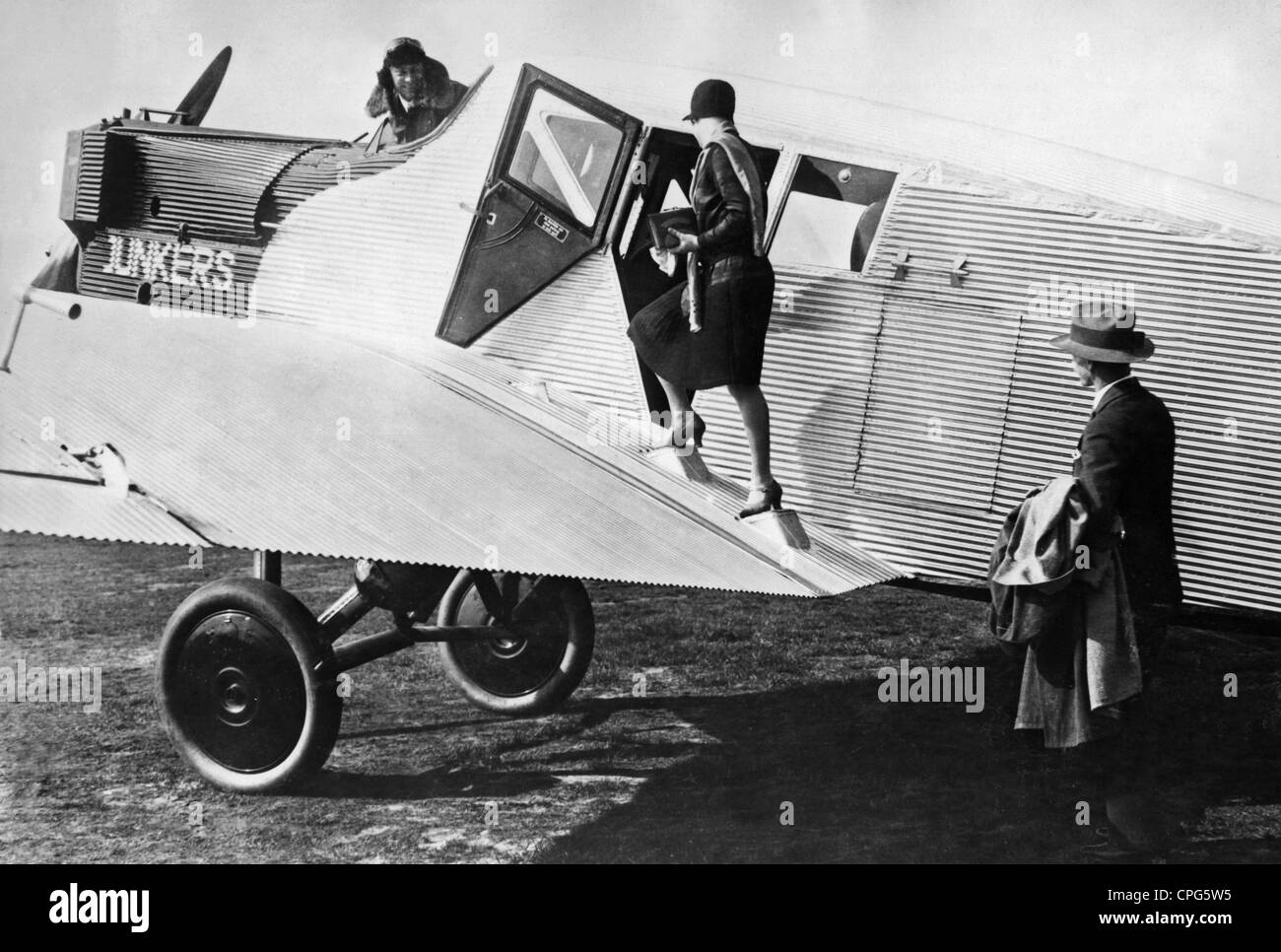 Men propeller driven plane aviation hi-res stock photography and images ...