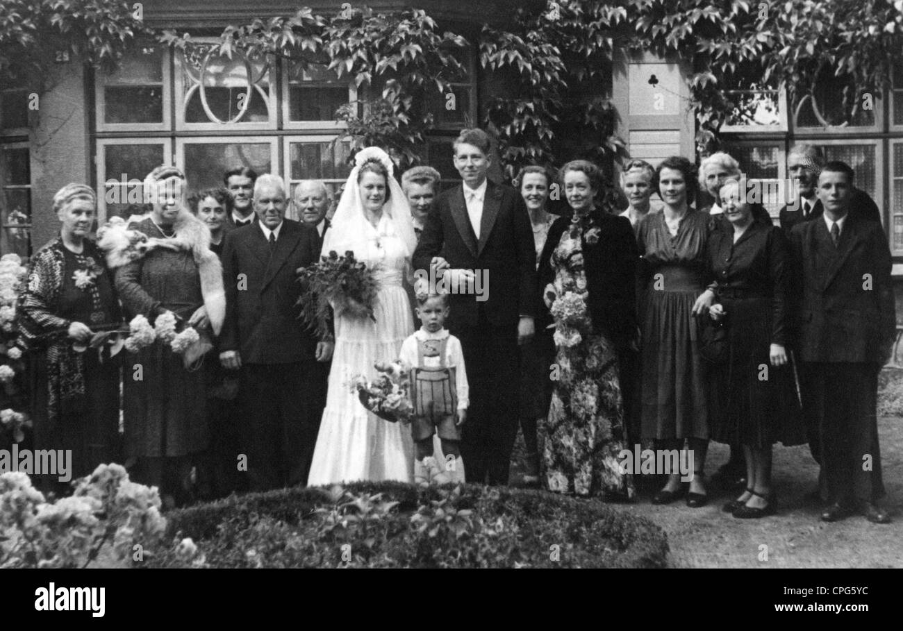 people, marriage, festivity, bridal couple with family and guests ...