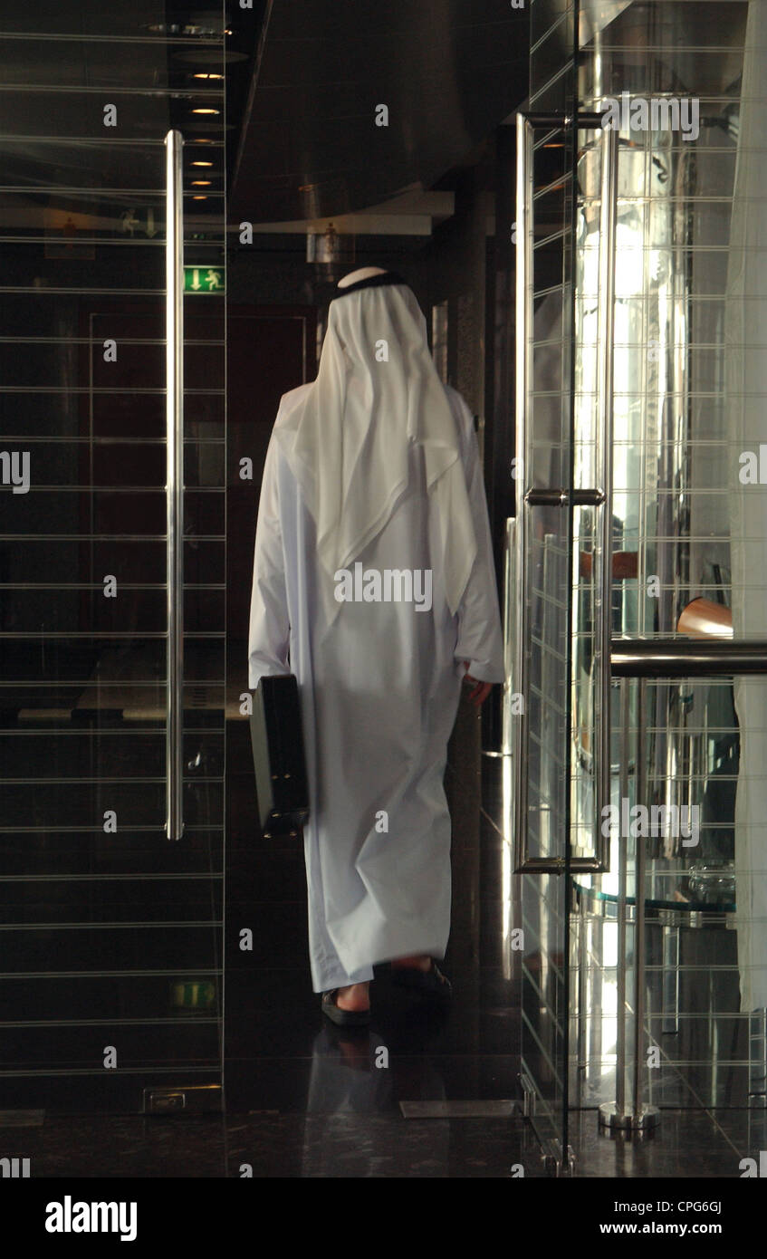 Arab Man walk inside the building Stock Photo - Alamy