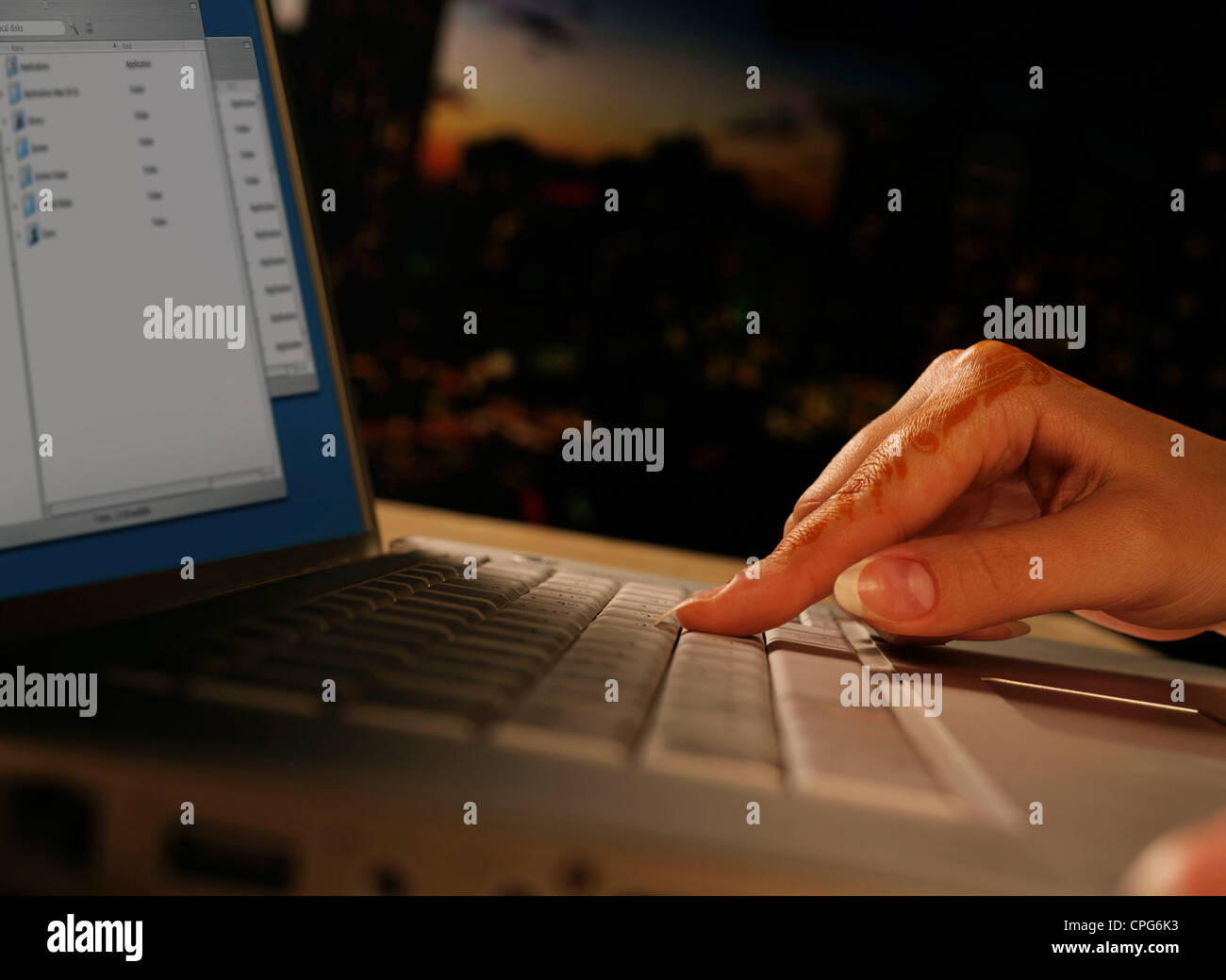 Hands with henna on keypad Stock Photo - Alamy