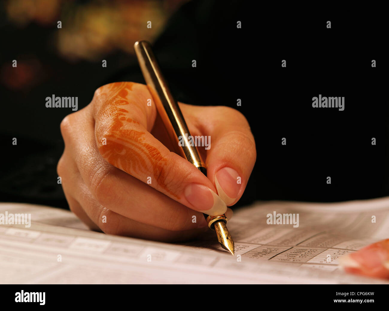 Arabic hands pen hi-res stock photography and images - Alamy