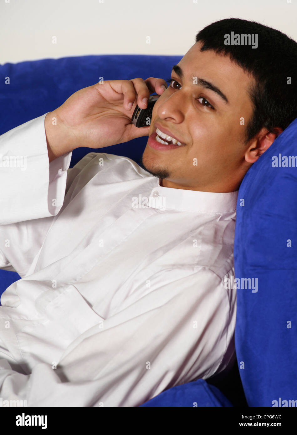 Arab boy on phone Stock Photo - Alamy