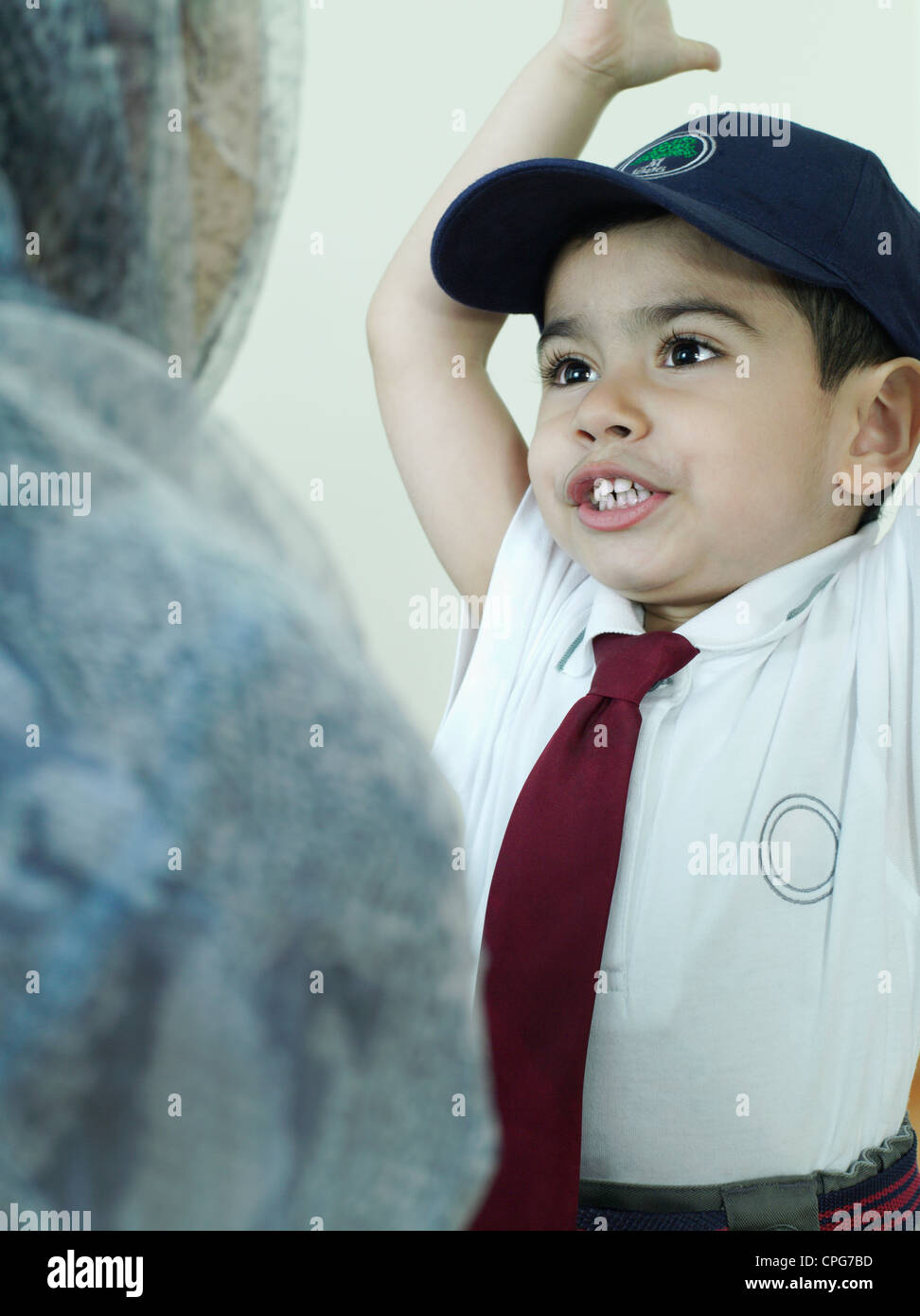 Arab boy wearing uniform Stock Photo - Alamy
