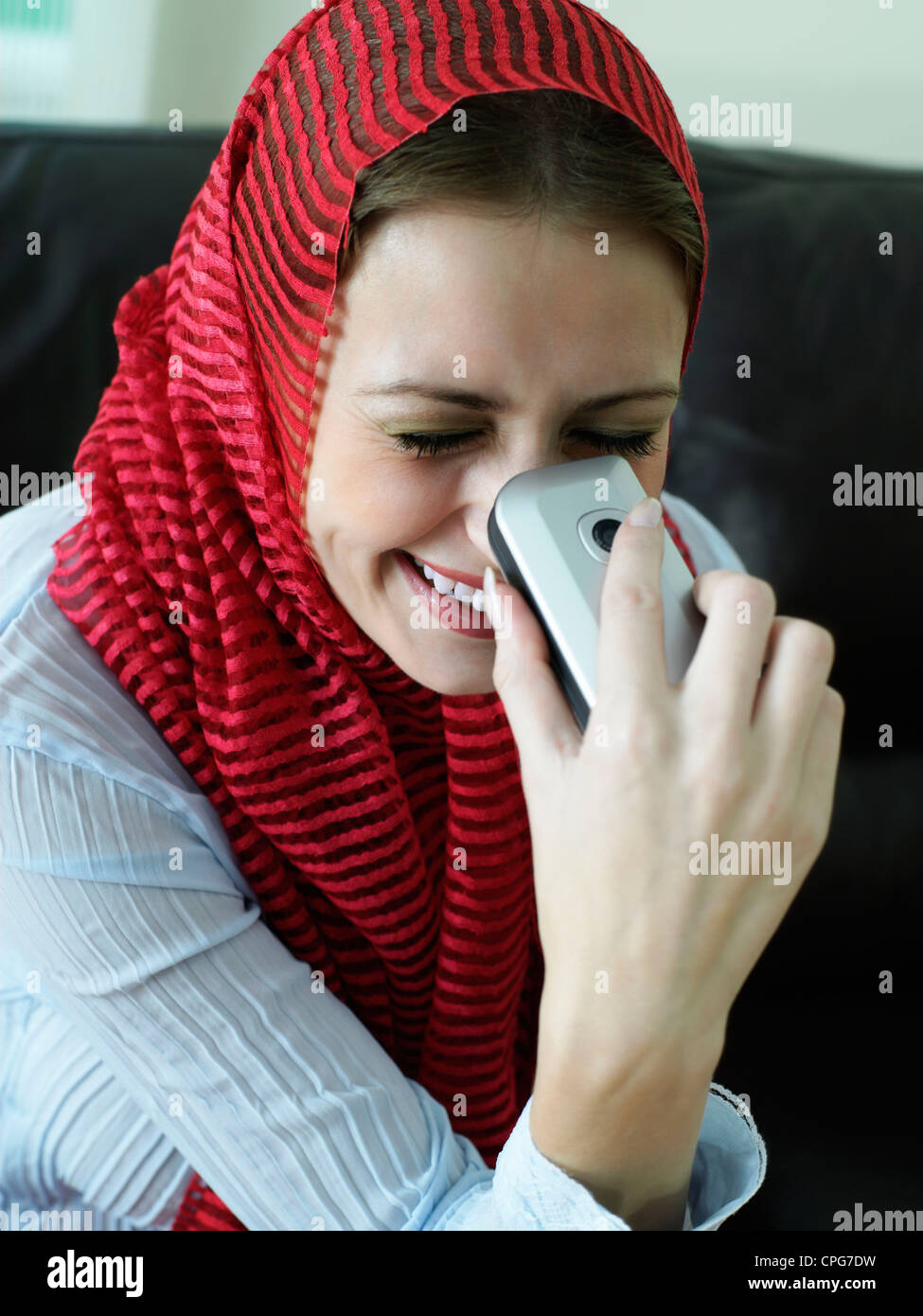 Arab lady on the phone Stock Photo - Alamy