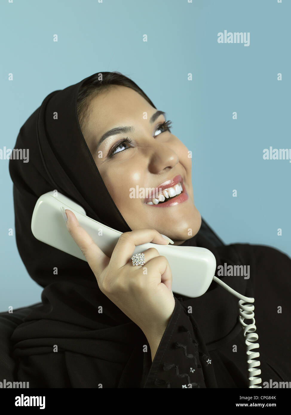 Happy arab women wearing veil hi-res stock photography and images - Alamy