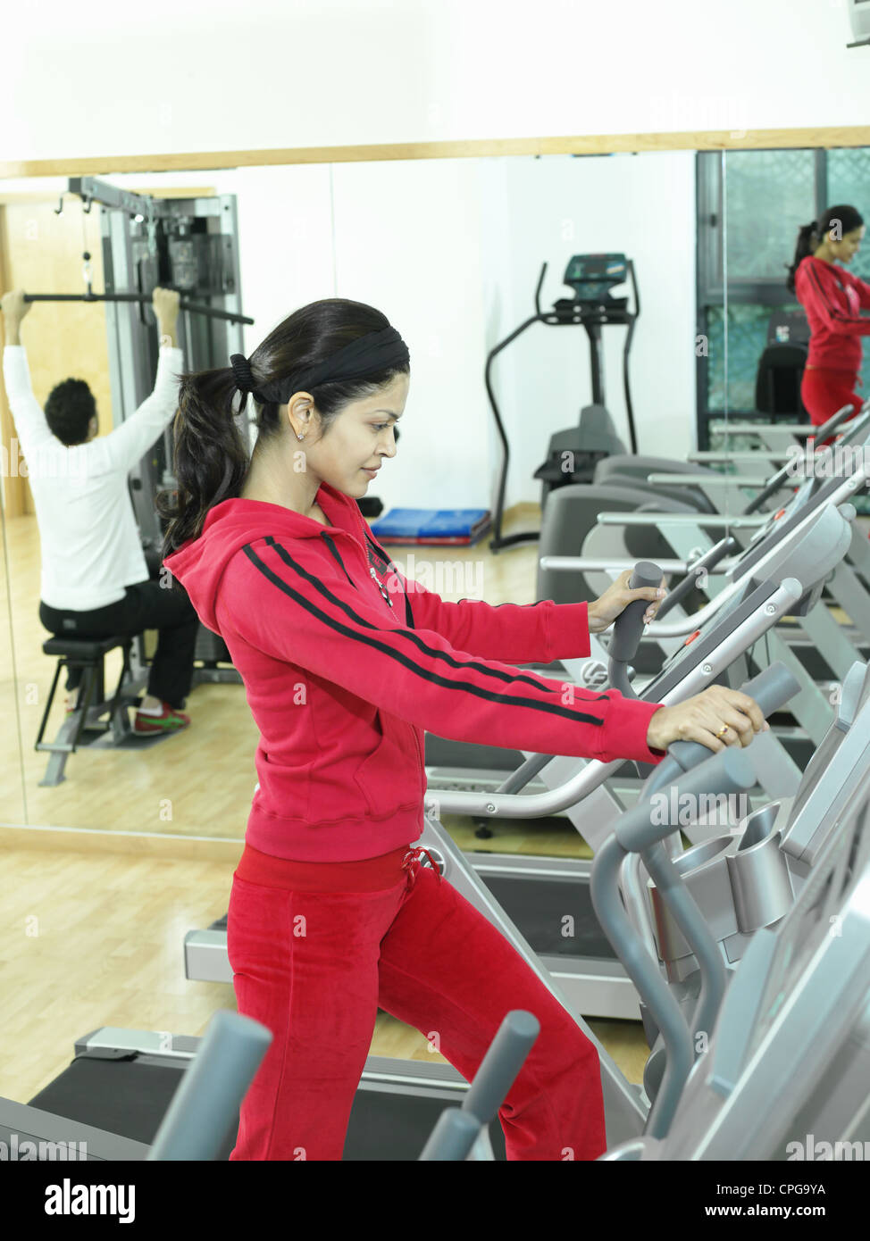 Young lady at the gym Stock Photo - Alamy