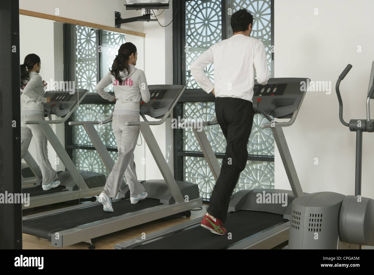 Young teenagers busy in the gym Stock Photo - Alamy