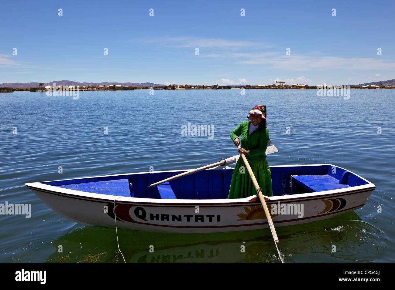 Aymara woman in a boat, Lake Titicaca, Bolivia, South America Stock ...