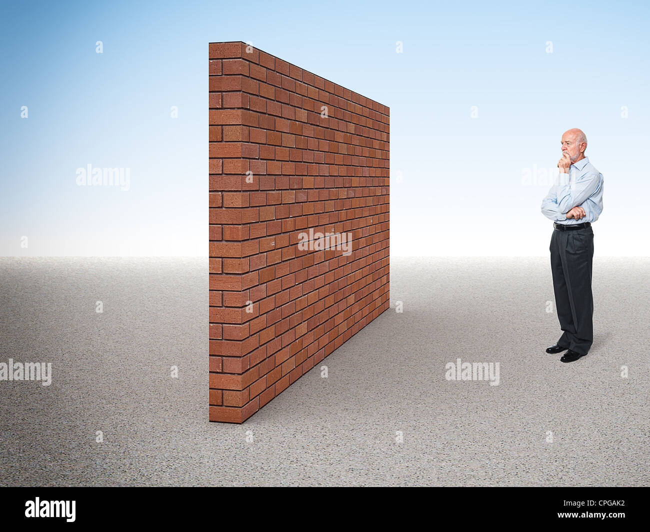 standing caucasian old man and 3d brick wall Stock Photo - Alamy