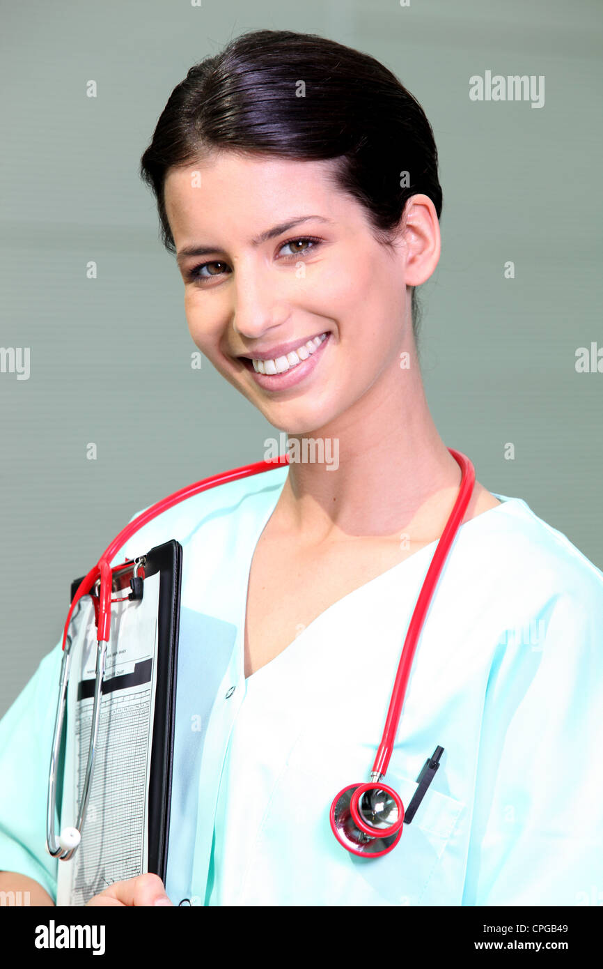 Portrait of a smiling nurse Stock Photo - Alamy