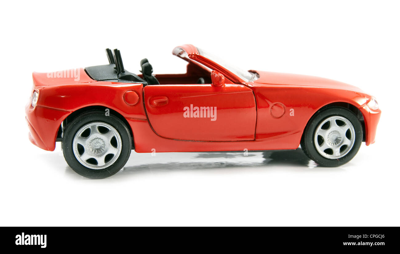 model of red car is isolated on a white background Stock Photo - Alamy
