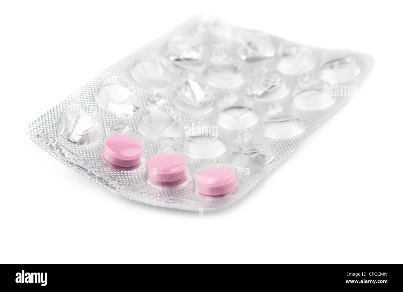 pink pills are isolated on a white Stock Photo - Alamy