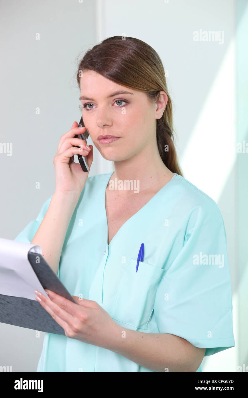 Nurse on the phone Stock Photo - Alamy