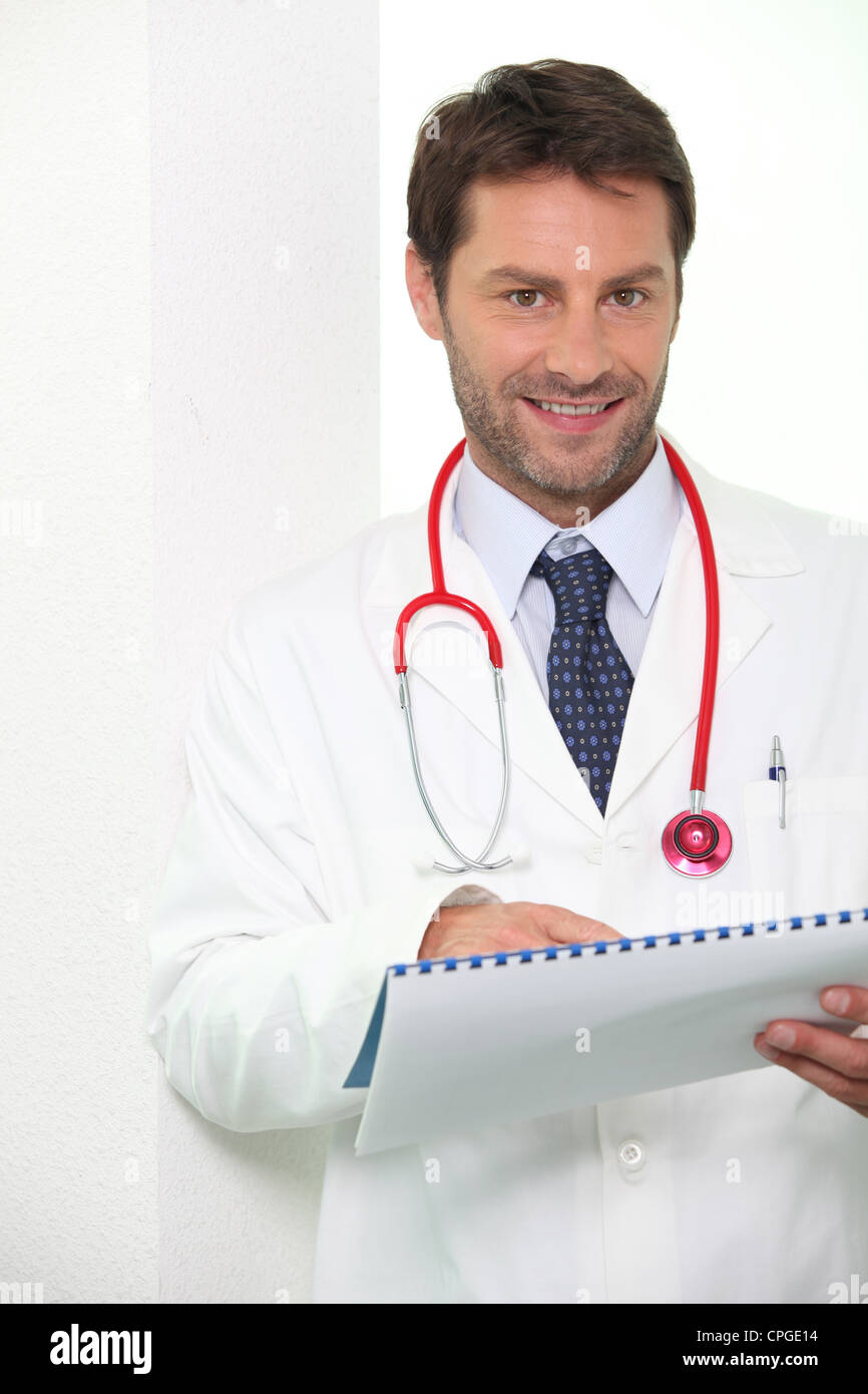 Young doctor with a report Stock Photo - Alamy