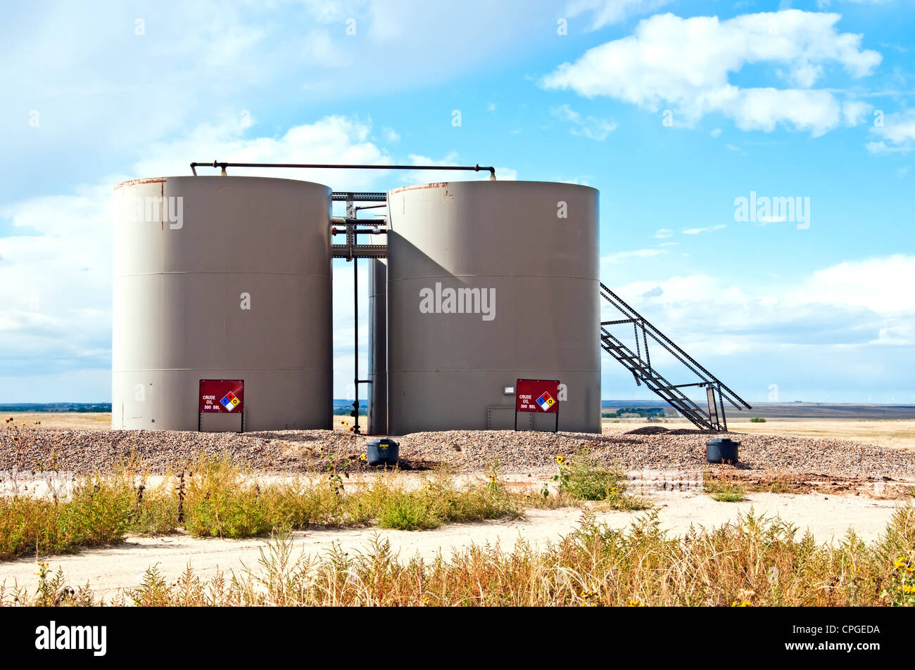 Location tanks to hold crude oil as it is pumped and treated to remove ...