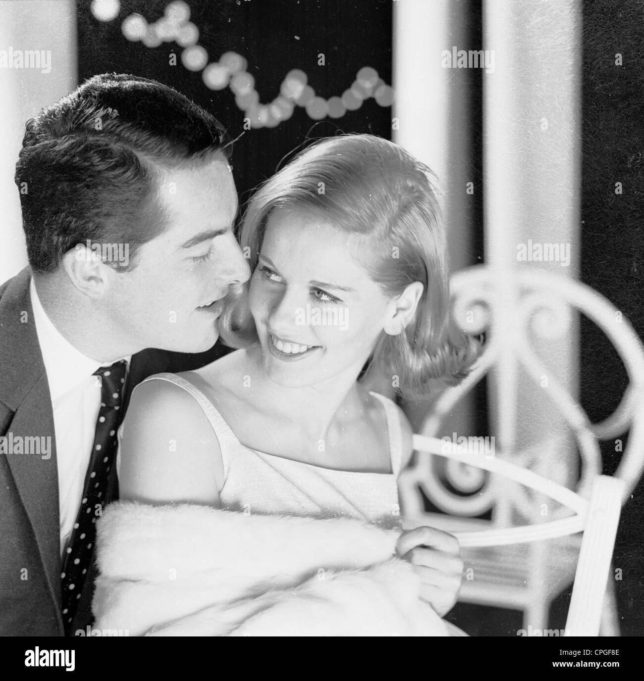 Romantic couple getting close. 1960s advertising still for Mackintosh's ...