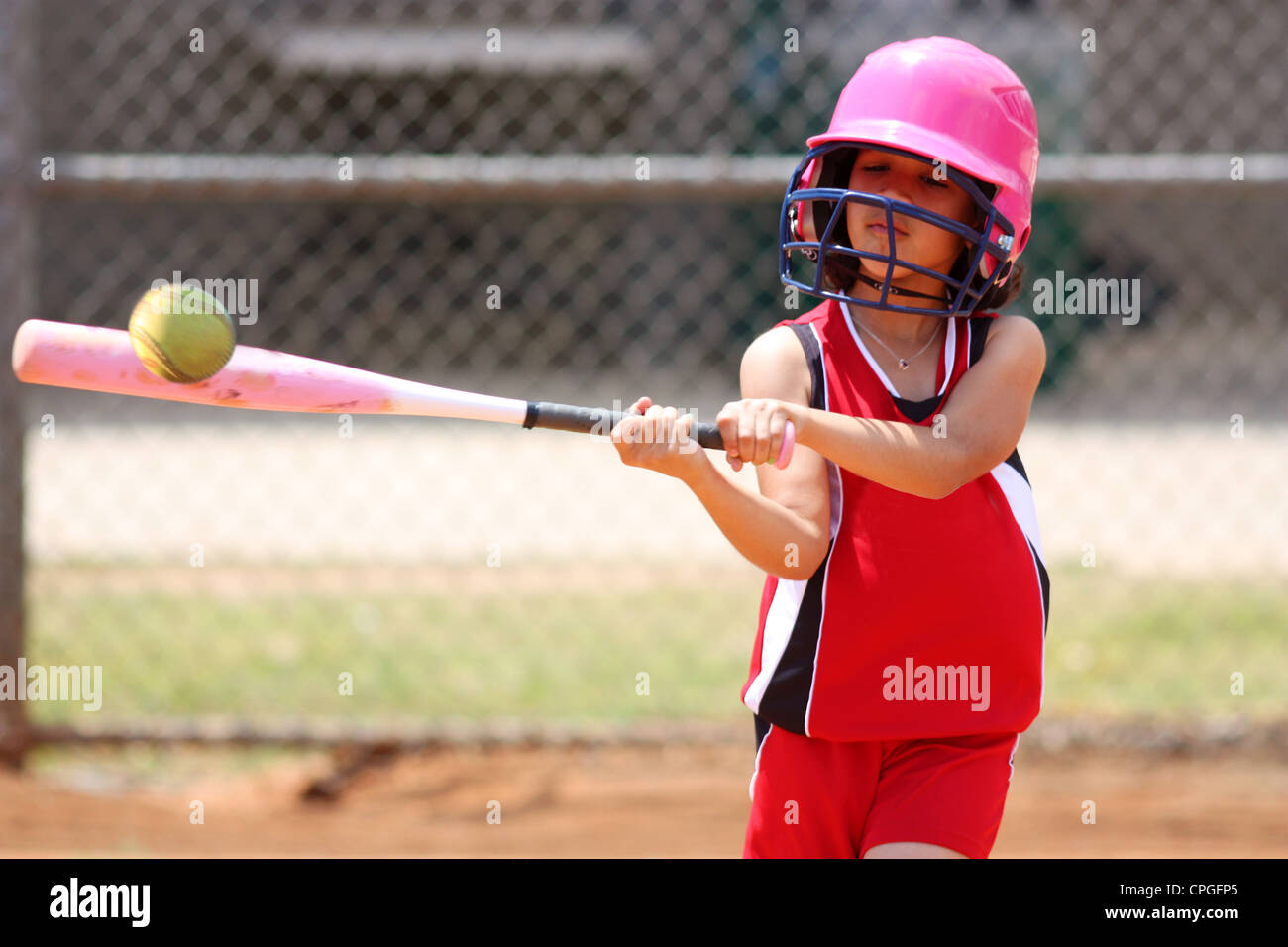 Girl Hitting Softball High Resolution Stock Photography and Images - Alamy
