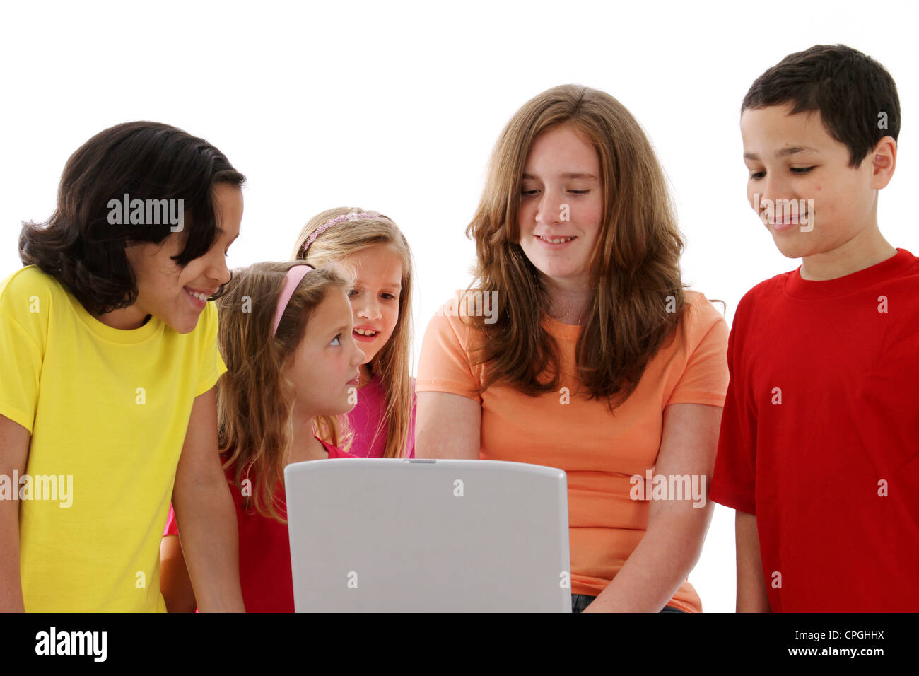 Children working together on a laptop computer Stock Photo - Alamy