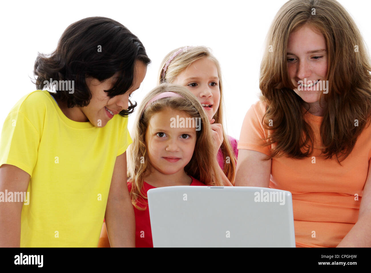 Children working together on a laptop computer Stock Photo - Alamy