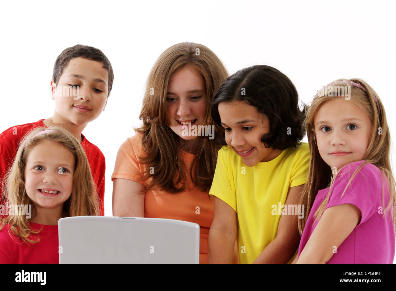 Children working together on a laptop computer Stock Photo - Alamy