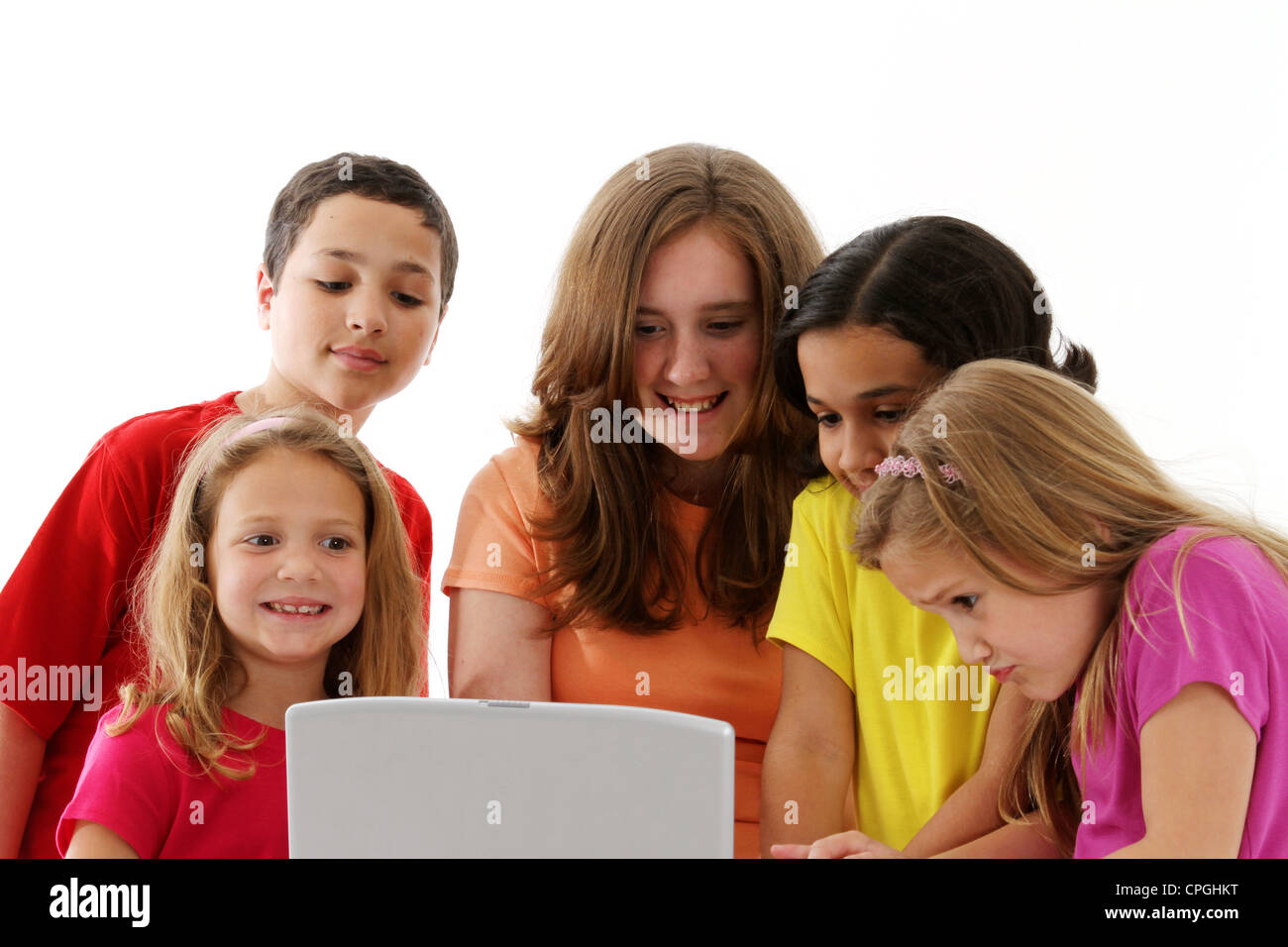 Children working together on a laptop computer Stock Photo - Alamy