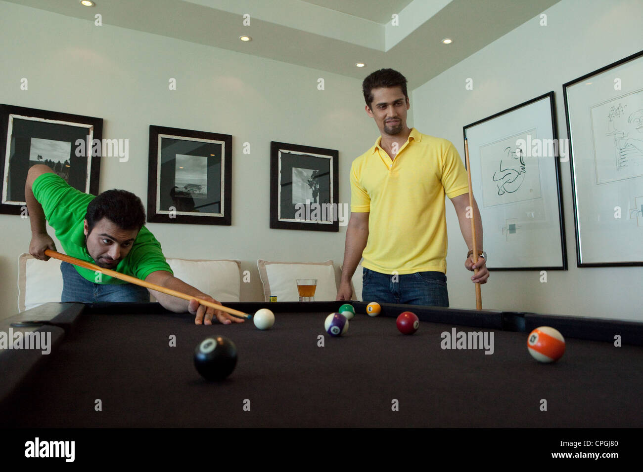 Men playing billiard Stock Photo - Alamy