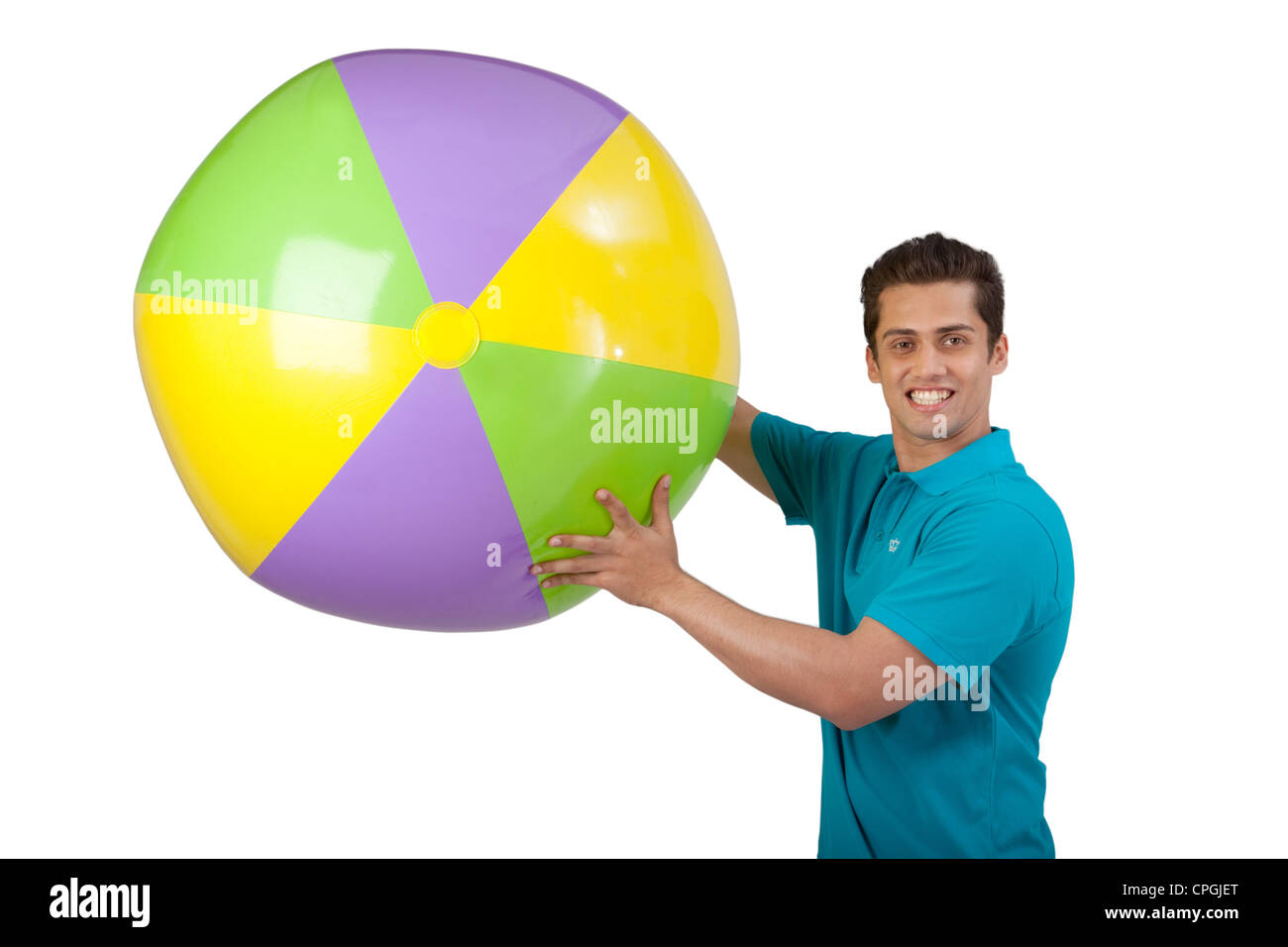 Man playing with beach ball Stock Photo - Alamy