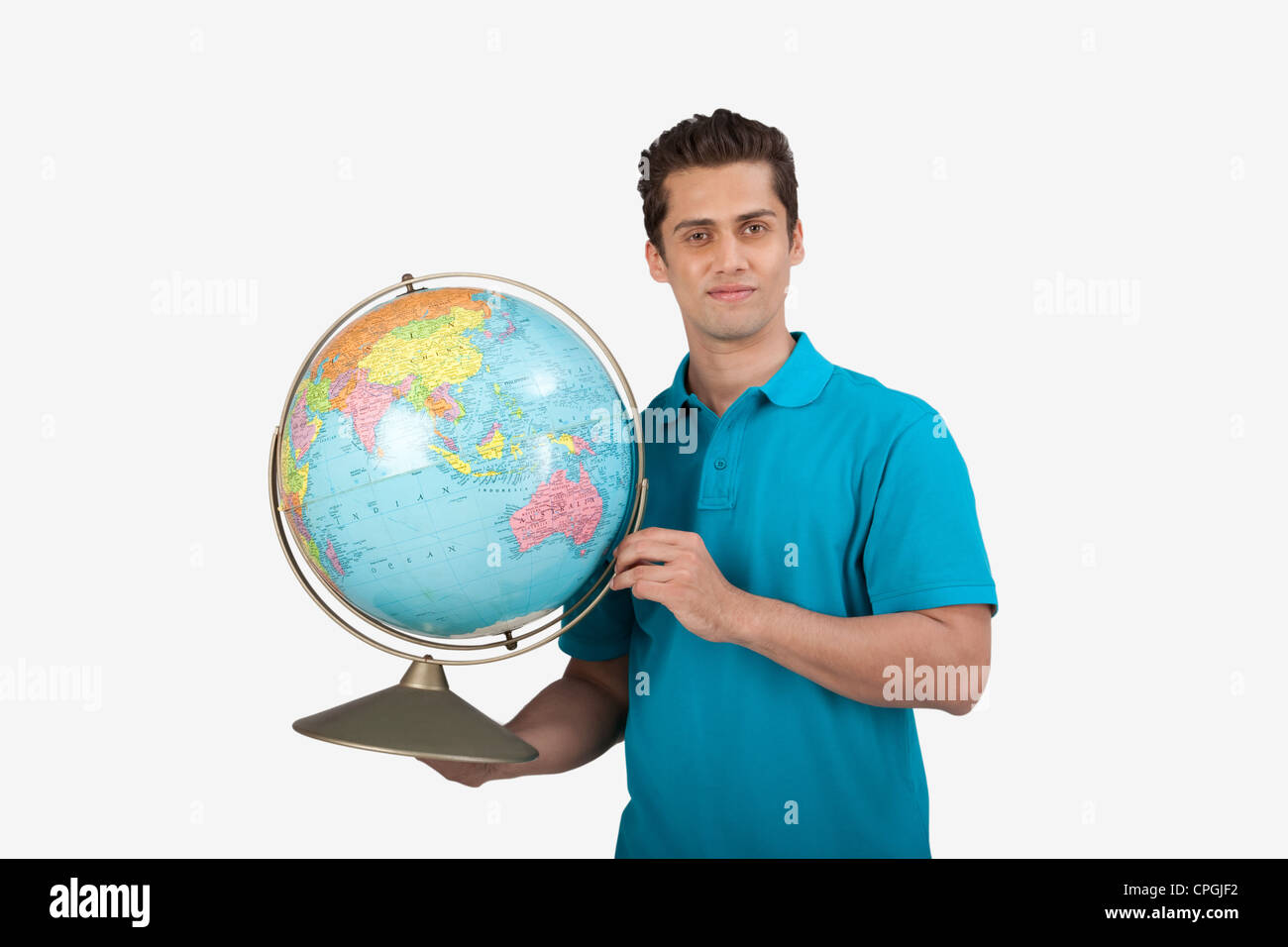 Man holding a globe Stock Photo - Alamy