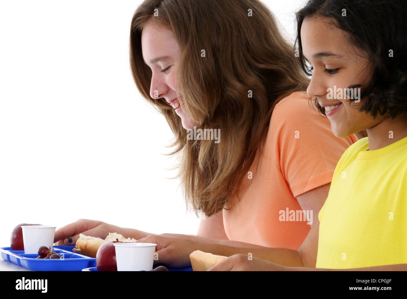 Kids eating their lunch together at school Stock Photo - Alamy