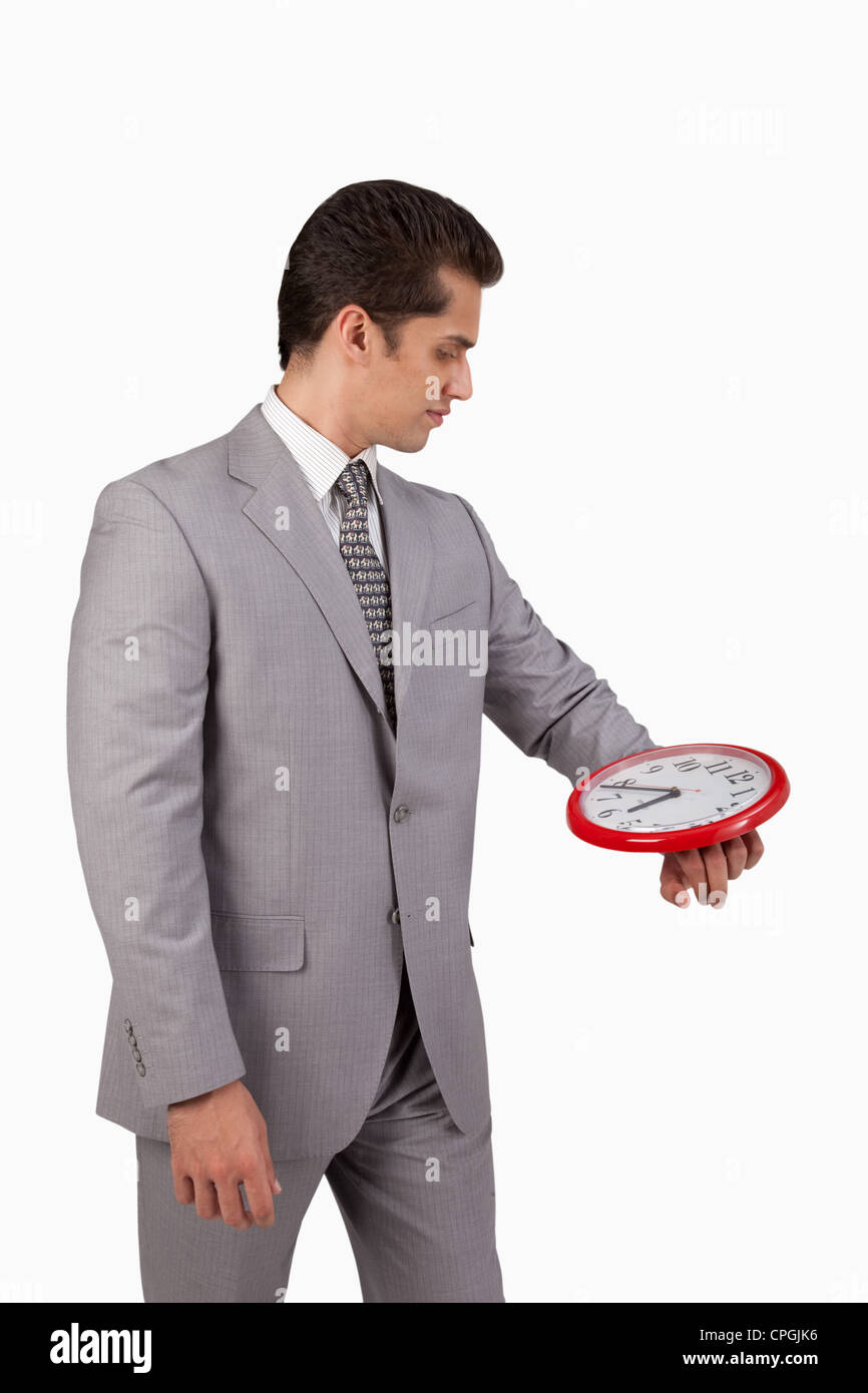 Businessman checking the time Stock Photo - Alamy