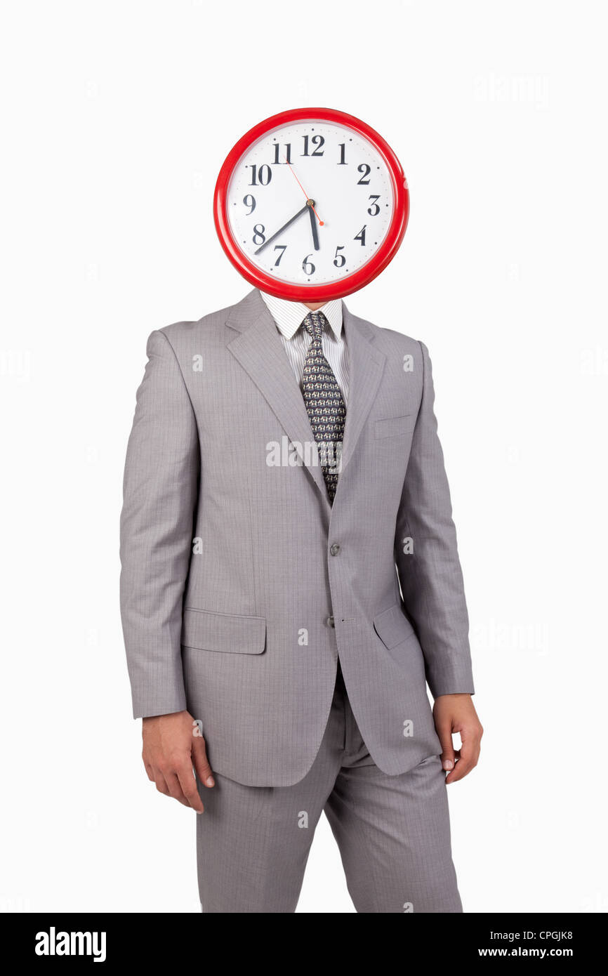 Businessman with clock face Stock Photo - Alamy
